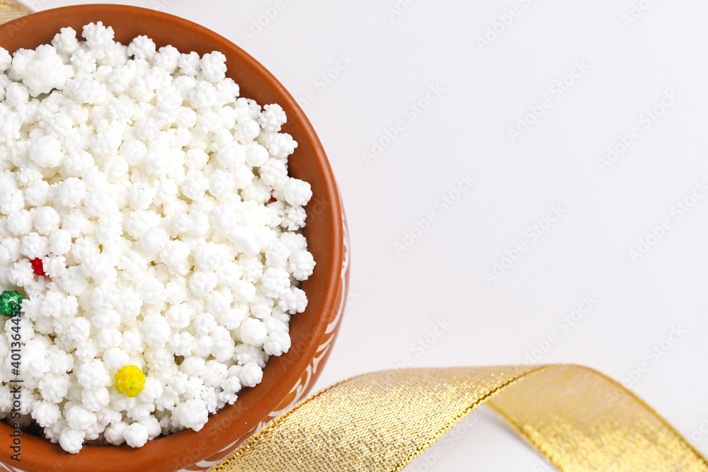 Indian festival makar sankranti concept : Tilgul in bowl with copy ...