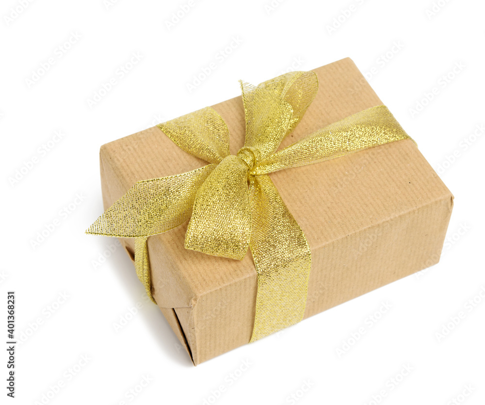 box wrapped in brown kraft paper and tied with golen ribbon, Stock ...