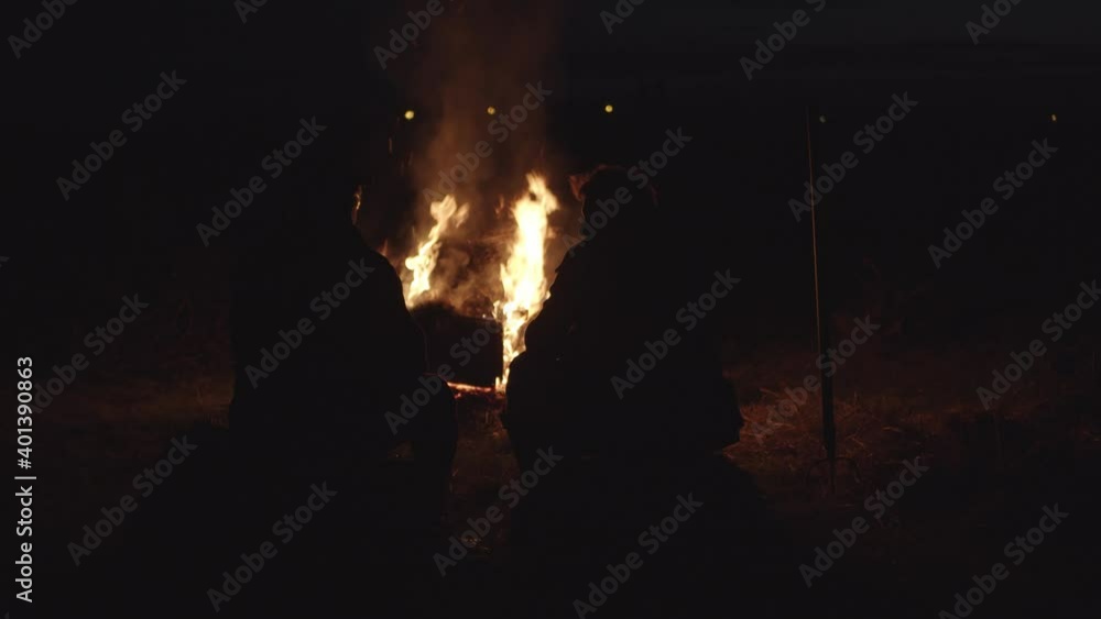 Campfire Conversation of 2 Men, Dark Night 4K Stock Video | Adobe Stock
