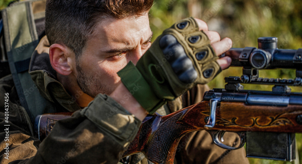 Hunter man. Hunting period. Male with a gun. Close up. Hunter with ...
