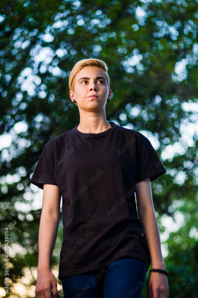 Young woman beauty Tomboy lifestyle with blonde short hair posing in ... Young woman beauty Tomboy lifestyle with blonde short hair posing in ...