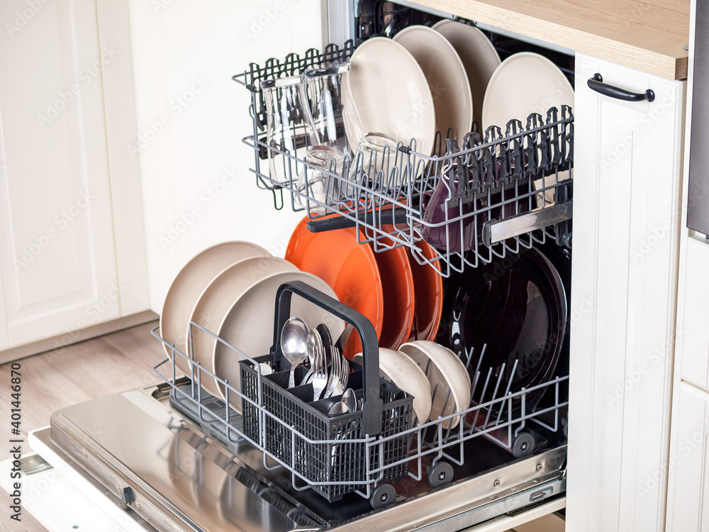 dishwasher close-up with washed dishes, easy to use and save water, eco ...