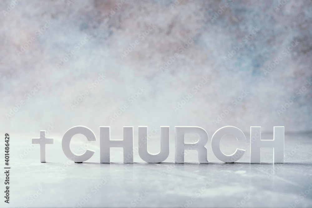 Word Church made with cement letters and cross on grey marble ...