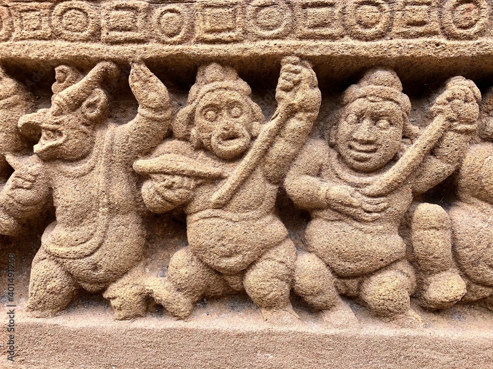 Hindu God deity statue. Ancient sandstone carved historical Hindu God ...