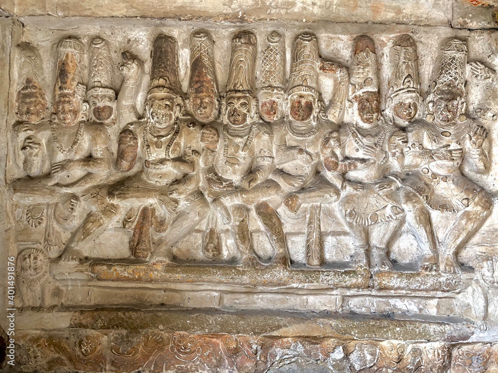 Hindu God deity statue. Ancient sandstone carved historical Hindu God ...