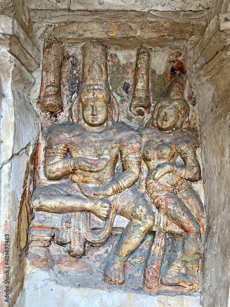 Hindu God deity statue. Ancient sandstone carved historical Hindu God ...