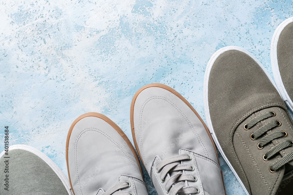 Casual male shoes on color background Stock Photo | Adobe Stock