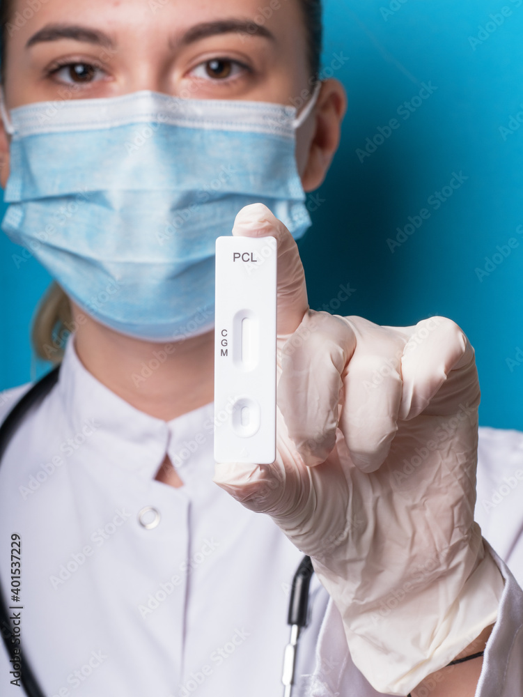 Doctor or medtech shows rapid laboratory COVID-19 test to detect IgM ...