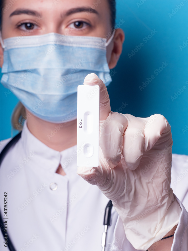 Doctor or medtech shows rapid laboratory COVID-19 test to detect IgM ... Doctor or medtech shows rapid laboratory COVID-19 test to detect IgM ...