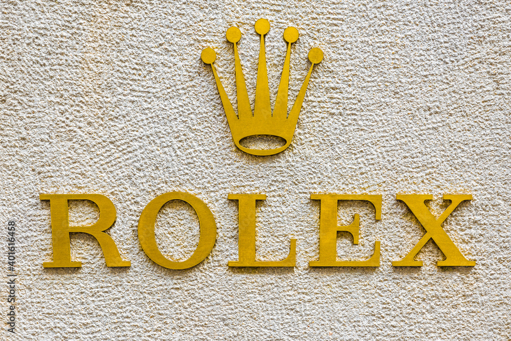 Rolex logo at the entrance to a store in an exclusive area of Milan ...