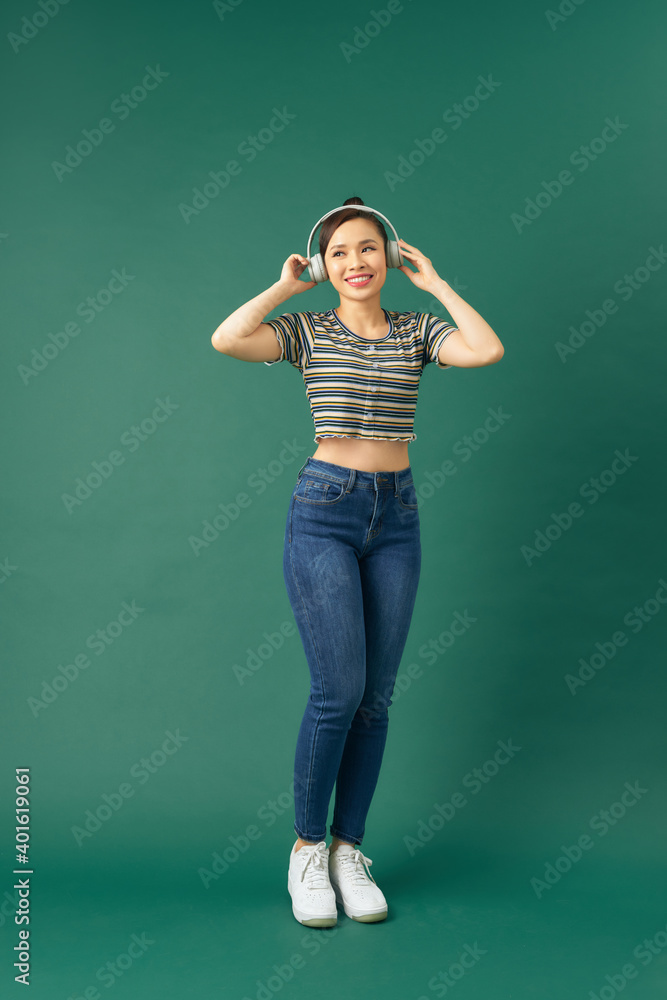 Full length body size photo of beautiful girl listening to music with ...