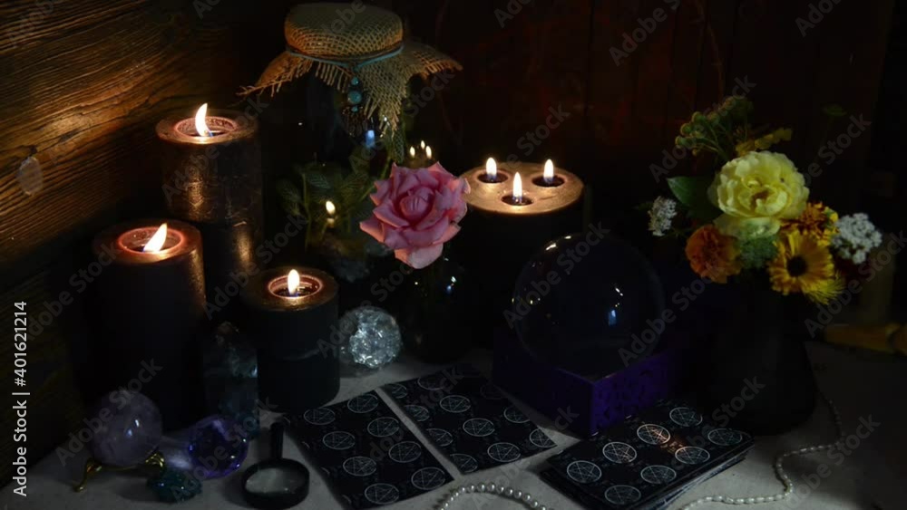 Mysterious still life with tarot cards, black candles and crystal ball ...