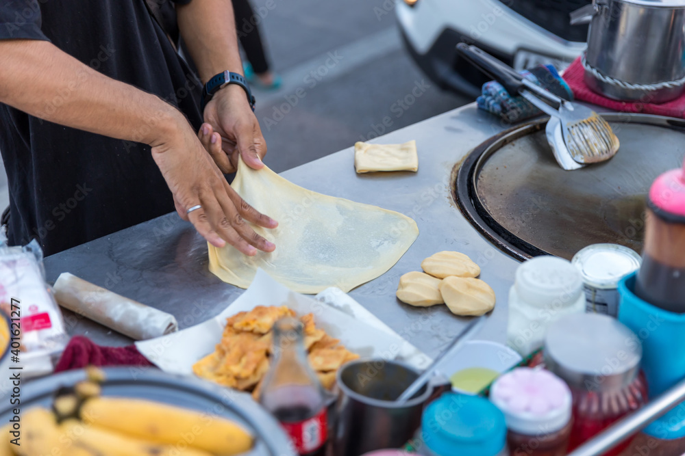 Roti Making, roti thresh flour by roti maker with oil. Indian ...