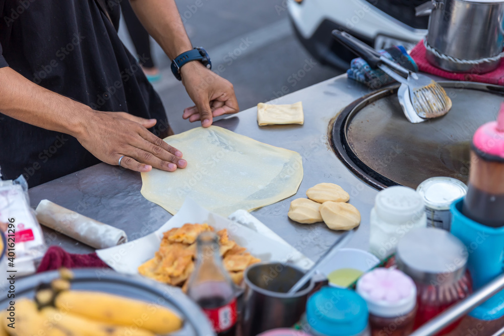 Roti Making, roti thresh flour by roti maker with oil. Indian ...