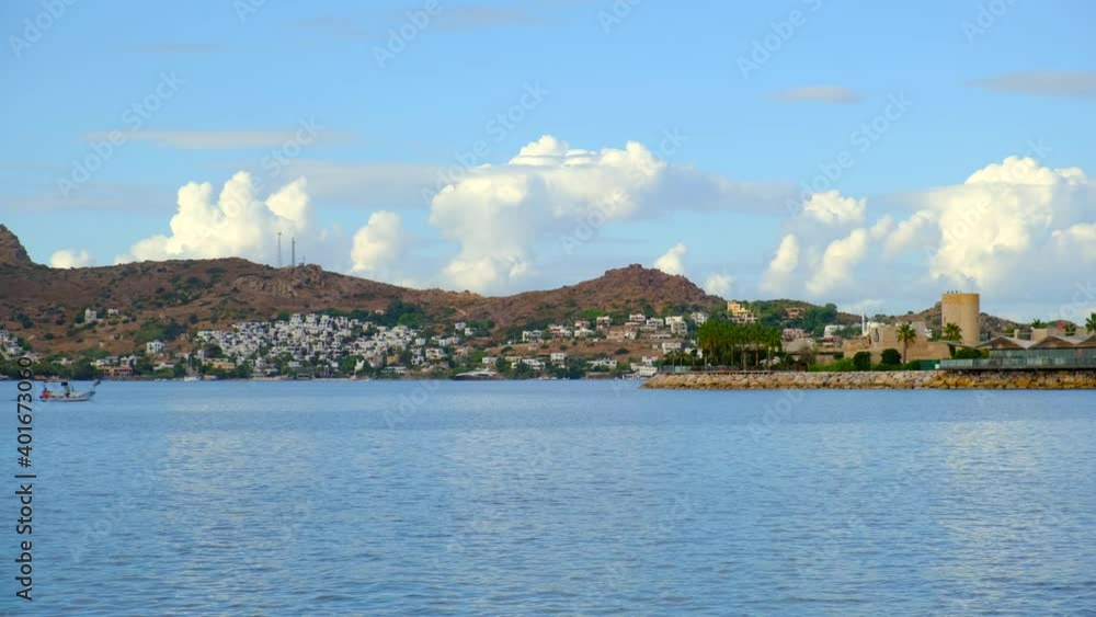 White Aegean houses of Yalikavak next to sea, marina, yachts and ...