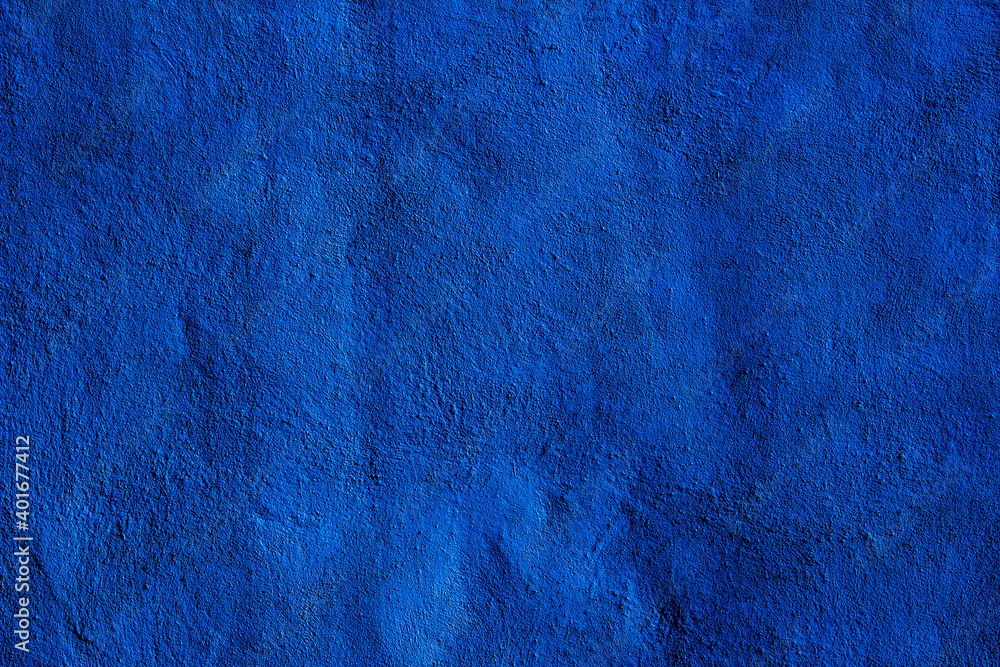 Blue colored abstract wall background with textures of different shades ...