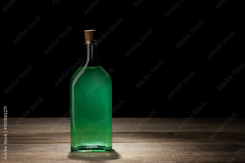 Vintage glass bottle of poison. Colorful poisons and potions concept ...