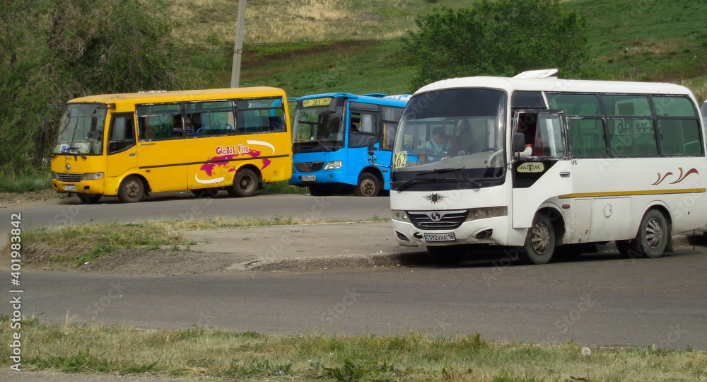 Kazakhstan, Ust-Kamenogorsk, may 21, 2020: Three chinese buses at the ...