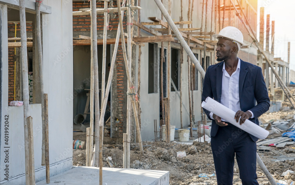 Black man races in a suit is an executive, a construction engineer ...