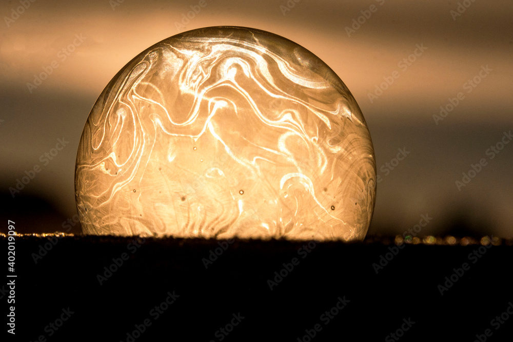 Frozen Sun Bubble Stock Photo | Adobe Stock