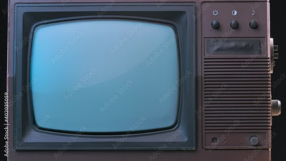 Brown Style retro Tv set with switchers. Old fashioned TV against a ...