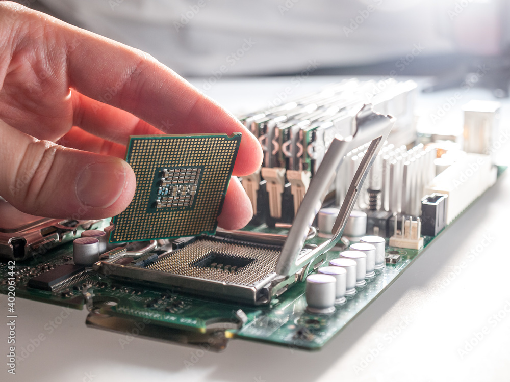 the process of connecting the CPU to the processor socket on a modern ...