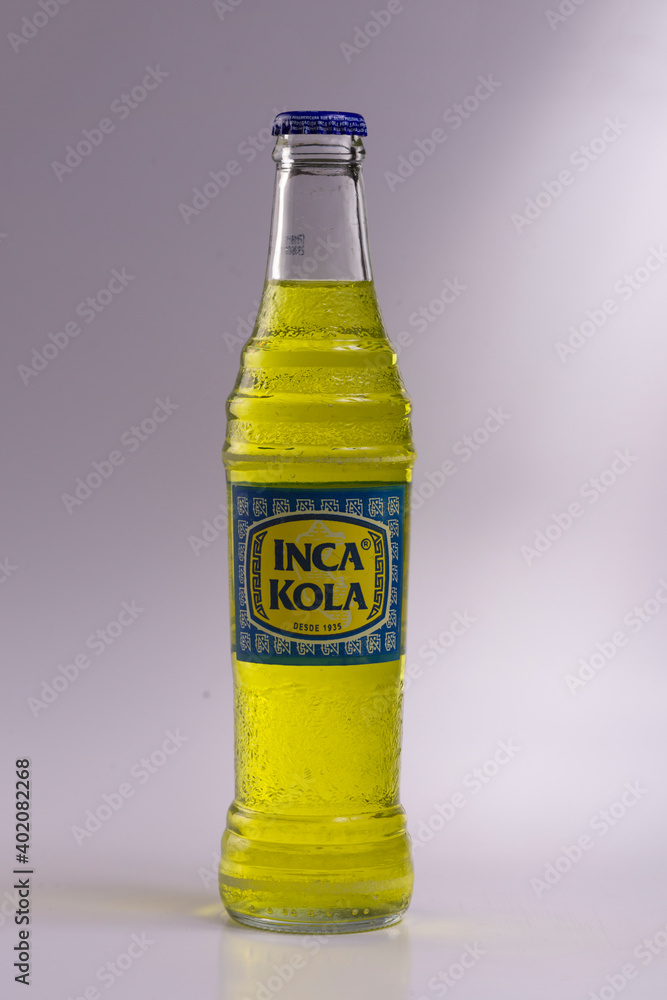 LIMA, PERU - CIRCA 2019: A classic glass bottle of Inca Kola soda drink ...