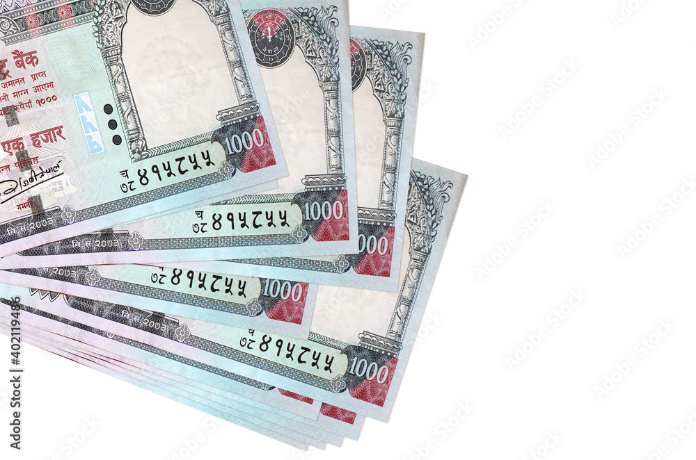 1000 Nepalese rupees bills lies in small bunch or pack isolated on ...