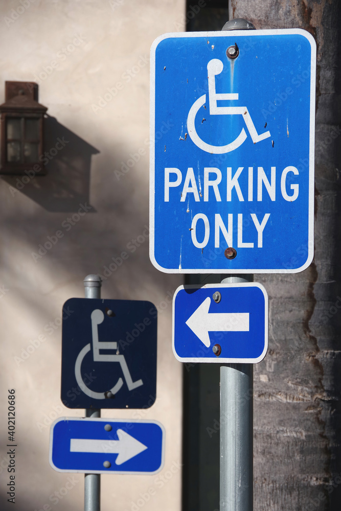 Two signs for a special handicap disability parking spot Stock Photo ...