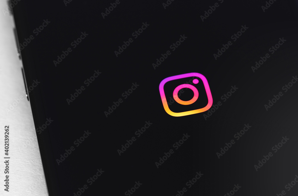 Instagram logo on the screen smartphone closeup. Instagram is a photo ...