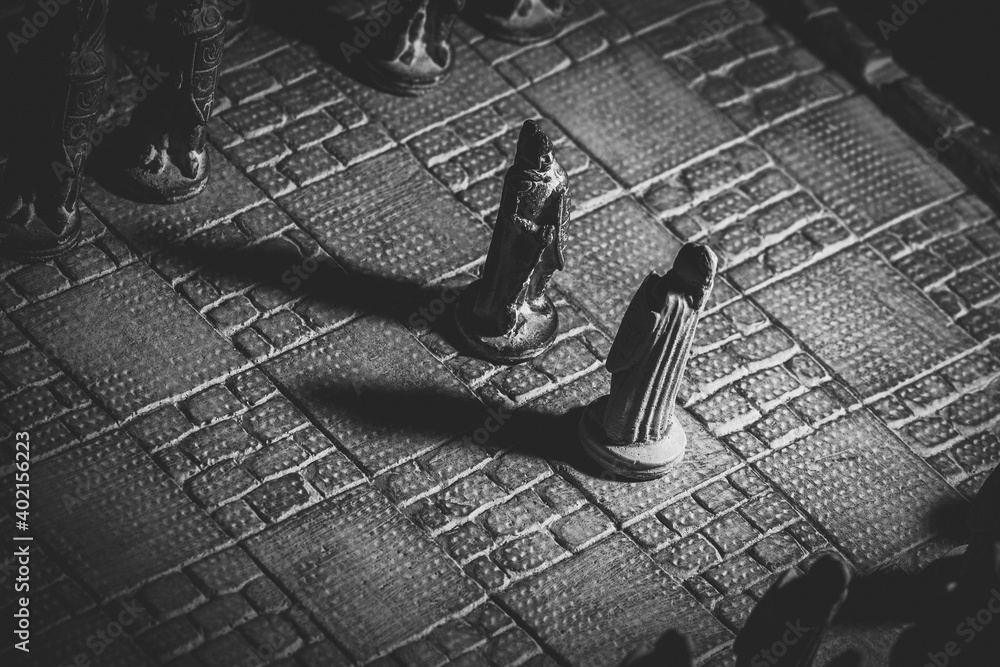 A black and white portrait of two soldier pieces of a game of chess ...