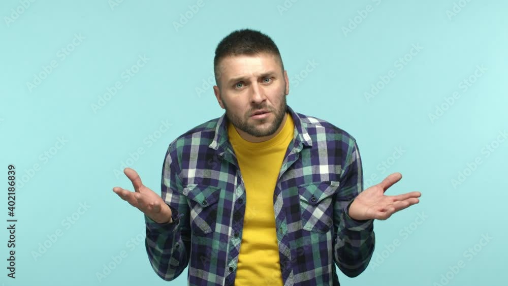 Slow motion of handsome middle-aged male model cant understand you ...