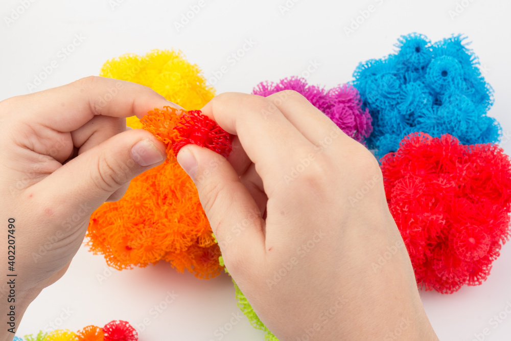 elements of children's designer of Velcro in kid hands,isolated on ...