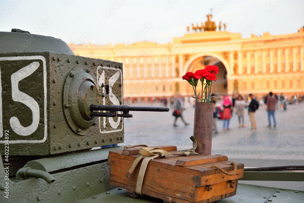 Red carnations in a gun case and box of shells at a small Soviet ...