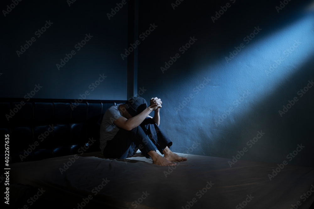 sad man in the dark room Stock Photo | Adobe Stock