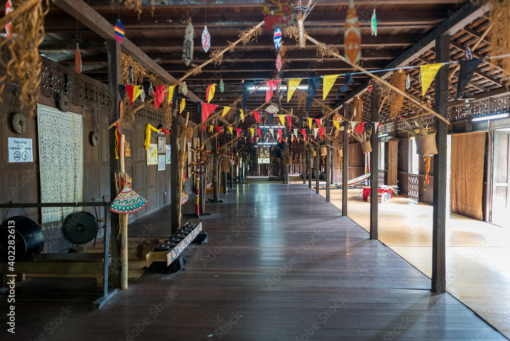 Traditional Iban longhouse with cultural-historical furnishings shows ...