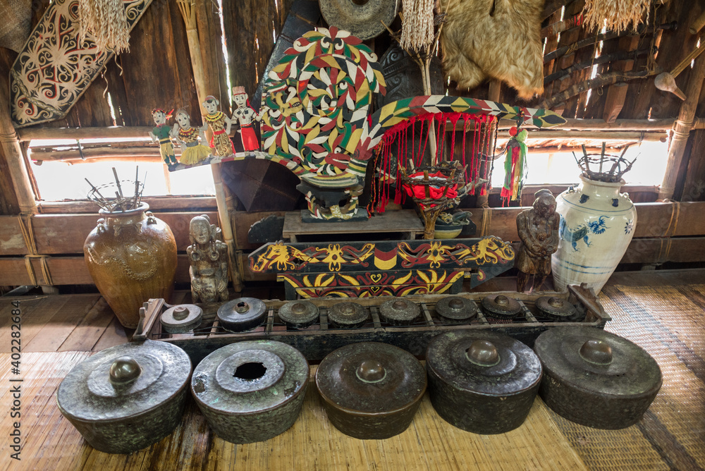Assembled items of the Iban culture of musical instruments, carvings ...