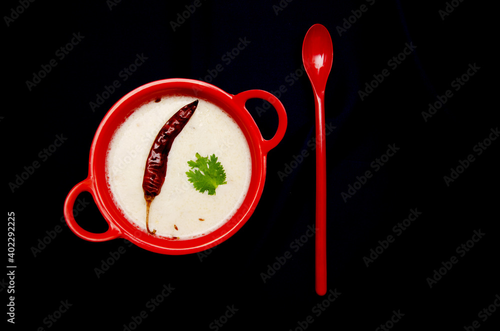 Kadhi or kadi, is an authentic Indian food, looks like Curry which is ...