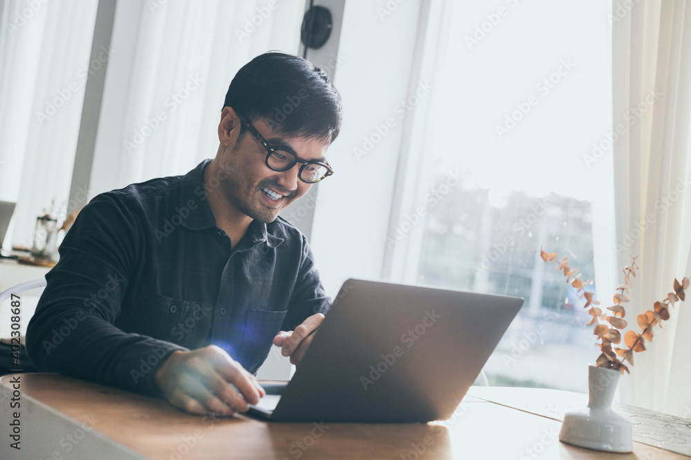 man work using computer hand typing laptop keyboard contact us online ...