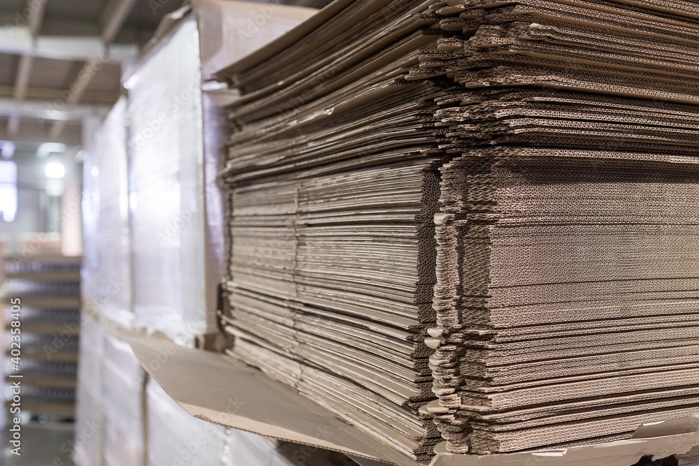 Perforated sheets of corrugated cardboard by stack on pallets - after ...