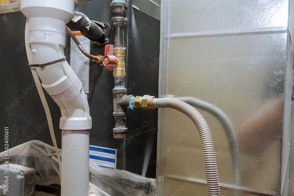 installation of heating system on the pipe system of heating closeup ...