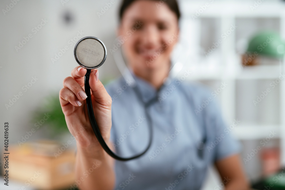 Beautiful female doctor working in the clinic. Beautiful nurse with ...