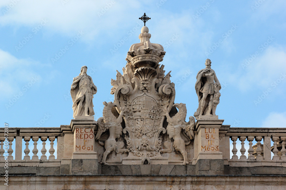 Detail of the facade of Royal Palace of Madrid over the Prince's Gate ...