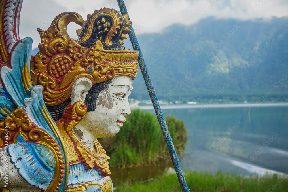 Beautiful traditional Balinese sculpture of Hindu deity Stock Photo ...