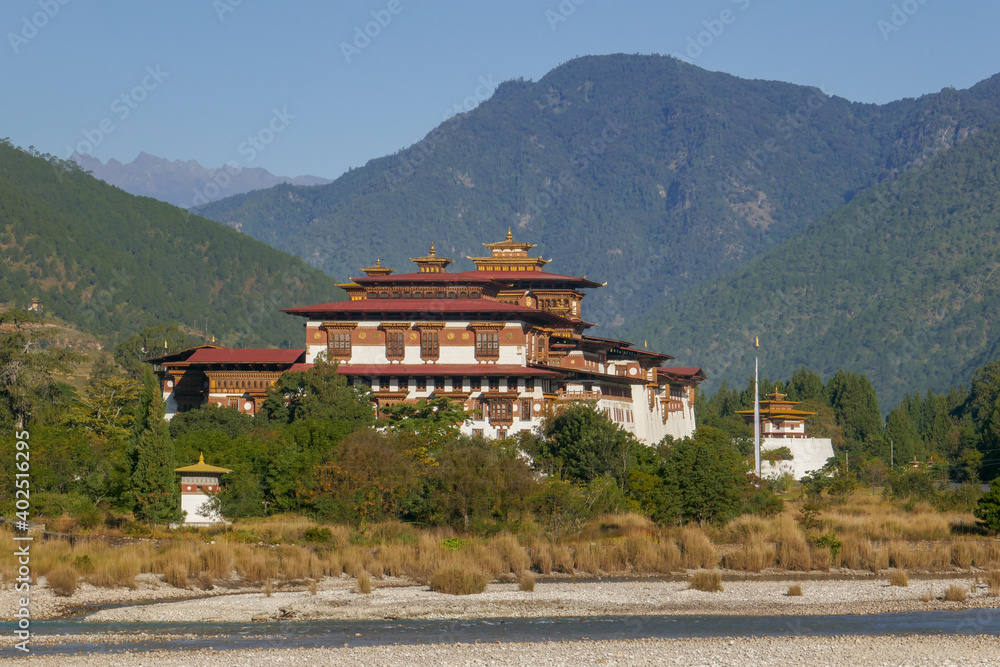 Side view of Punakha dzong in Western Bhutan with Mo Chhu river in ...