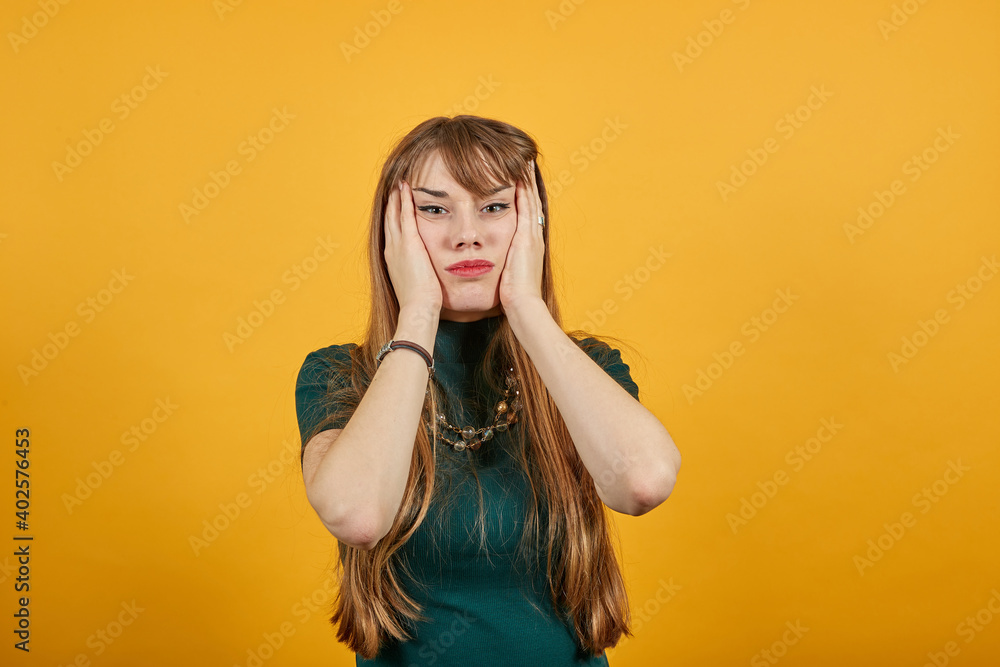 Stupefied beautiful young caucasian over isolated background expresses ...