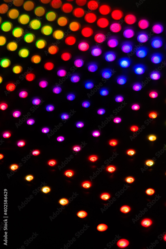 Colourful RGB LED lights on black background. LED Matrix with WS2812B strips. Playing animations ...