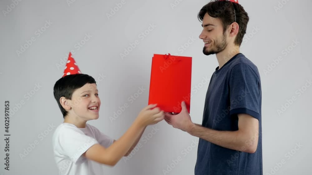 Boy gives a gift with a cap. Birthday. post messages or various ...