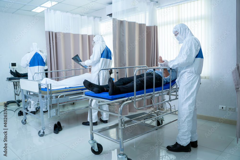 Doctor in hazmat PPE protective clothing wear medical rubber gloves ...