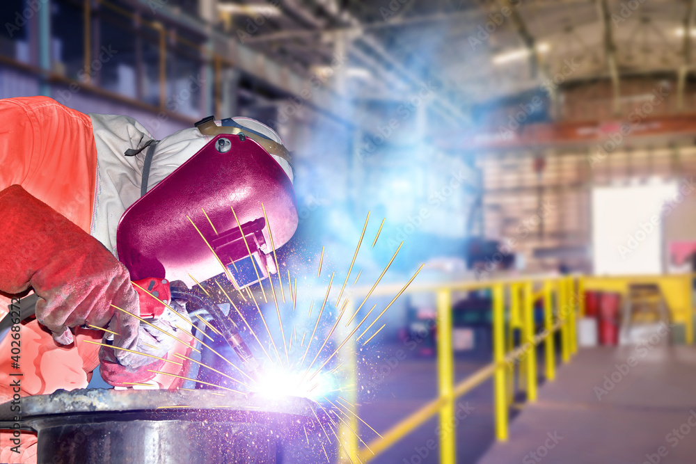Welder industrial in factory welding process worker by Mig Weld with ...
